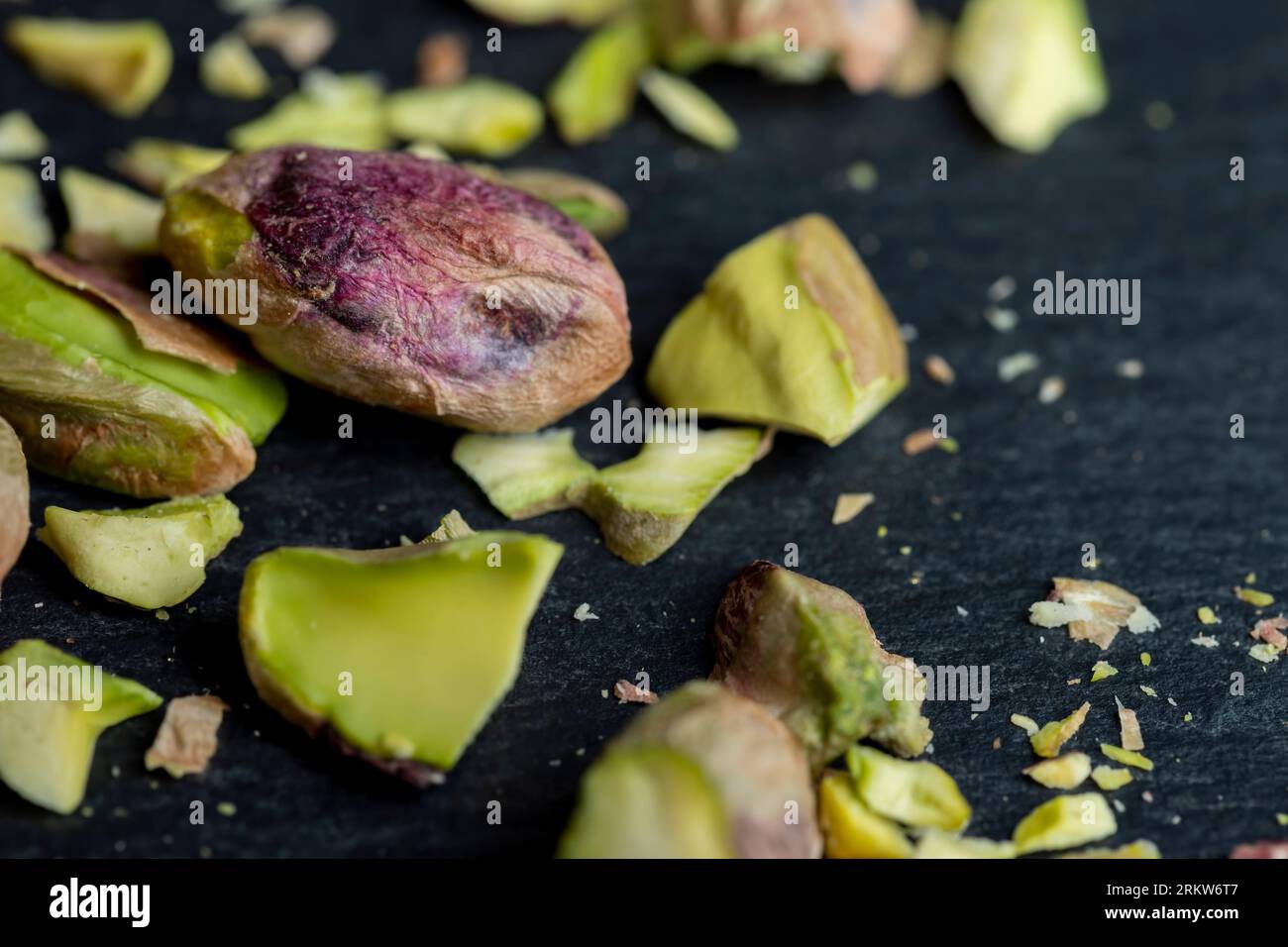 Crispy delicious pistachios with salt without shell, peeled and striped ...