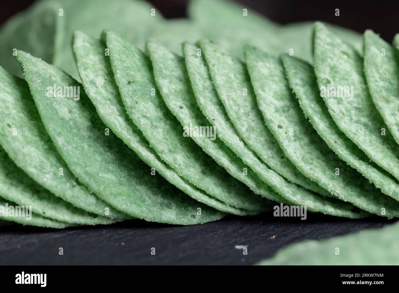 Thin and delicious green potato chips, crispy green chips with pepper ...
