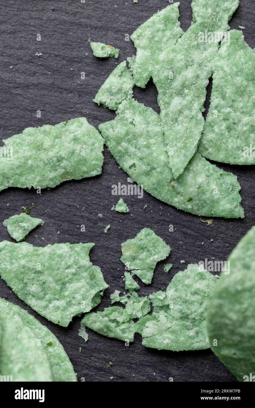 Thin and delicious green potato chips, crispy green chips with pepper ...