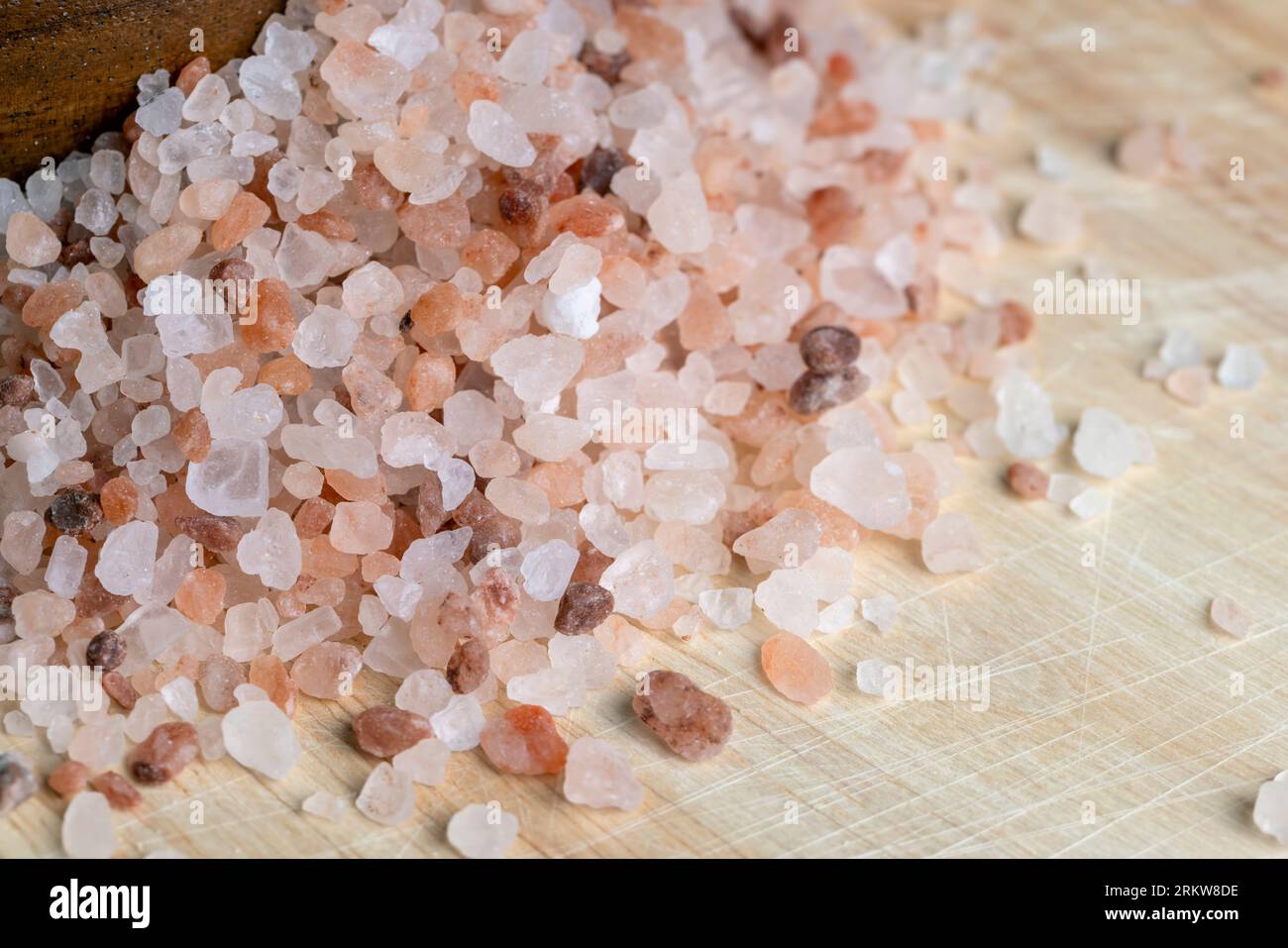 A large number of pink salt crystals of different sizes, a lot of pink ...