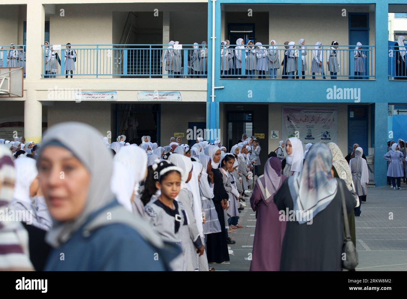 Palestinian refugee schoolgirls, in their UN school for the first day ...