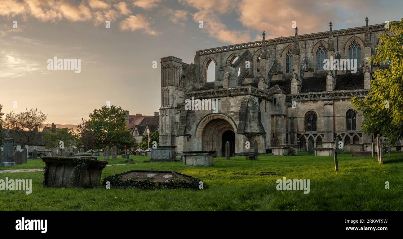 The last sunshine of the day sidelights the historic abbey at the ...