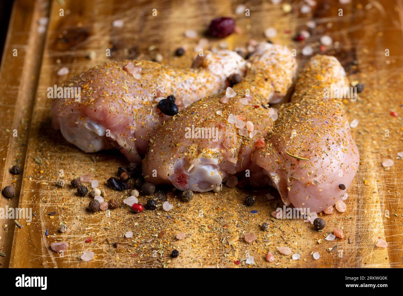 Freshly washed and skinned chicken meat, chicken legs with salt and ...