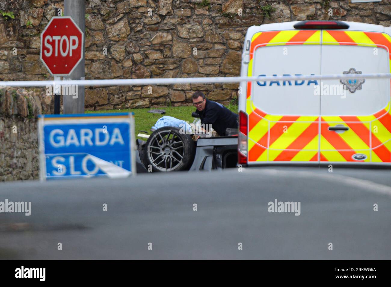 Forensic collision investigators examine the scene of a crash which ...