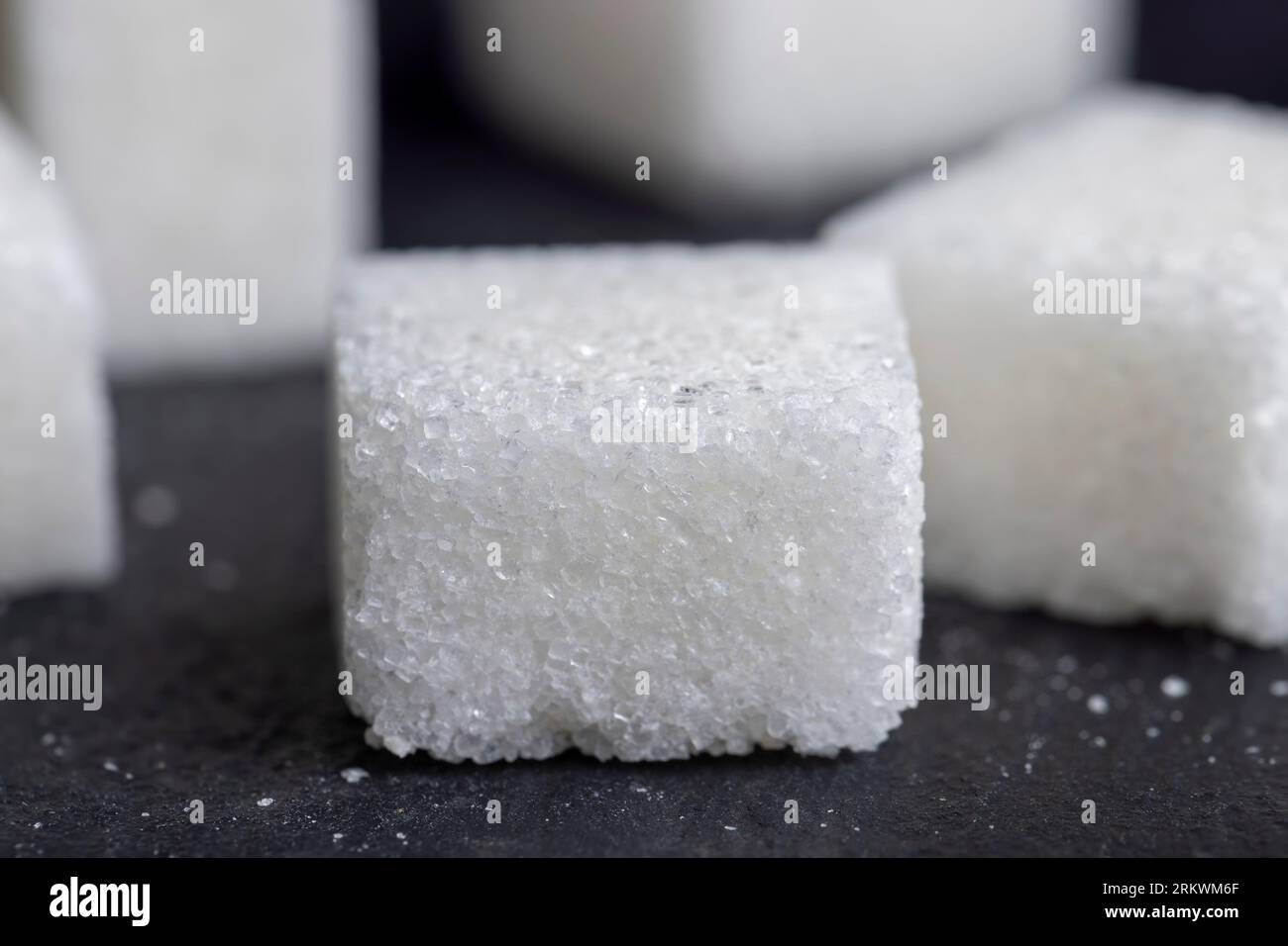 White sugar made from beetroot, cubes of white beet sugar close-up ...