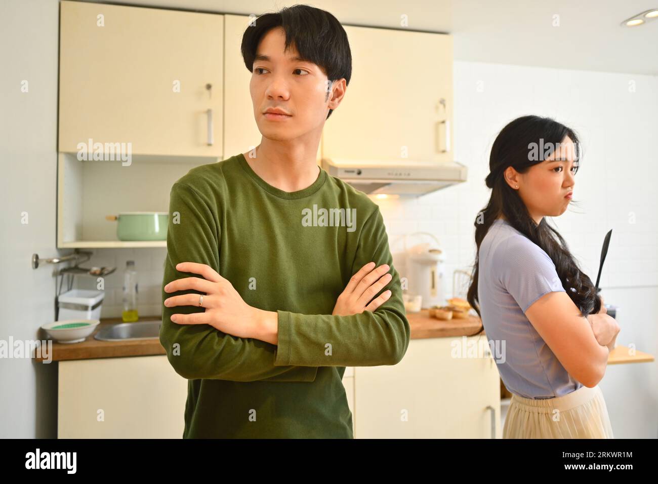Emotional couple quarreling during family hi-res stock photography and ...