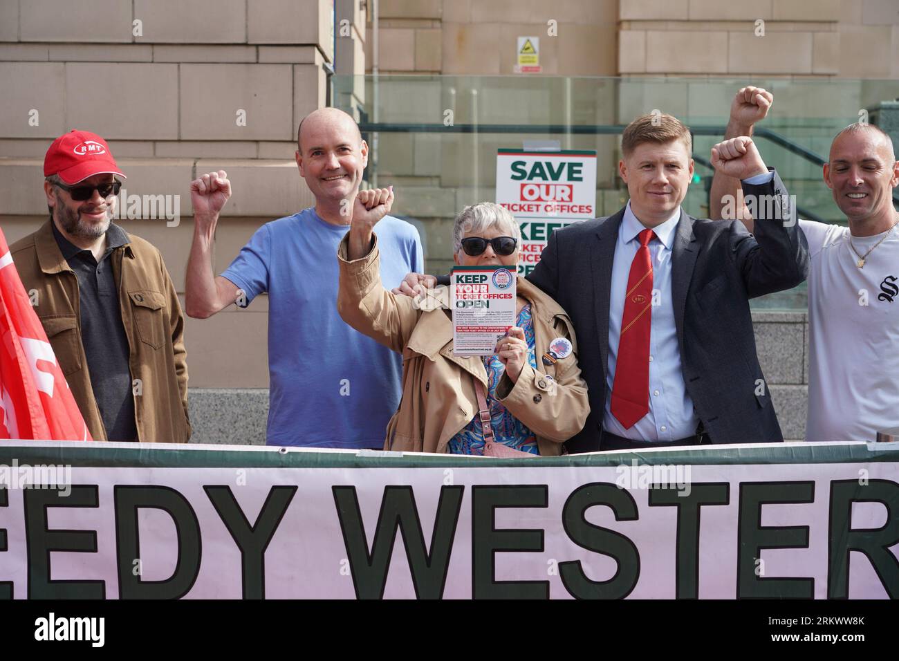 RMT senior assistant general secretary Eddie Dempsey (second right ...