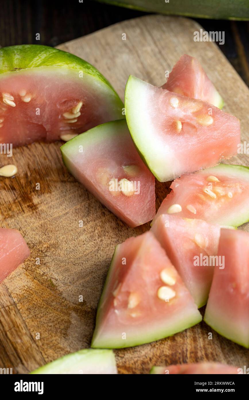 not sweet not ripe cut watermelon, Unripe watermelon of small size with ...