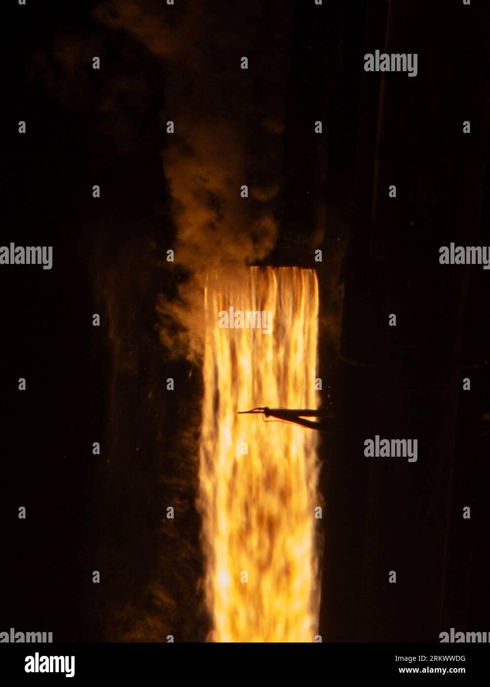 Kennedy Space Center, United States. 26th Aug, 2023. Flames fire from a ...