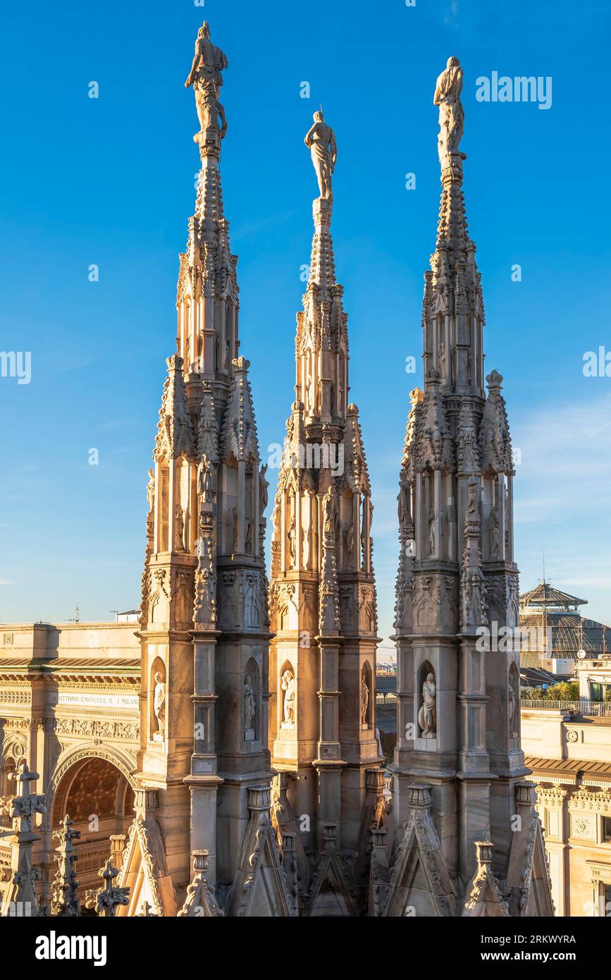The spires and pinnacle sculptures on the roof of the Milan Cathedral ...