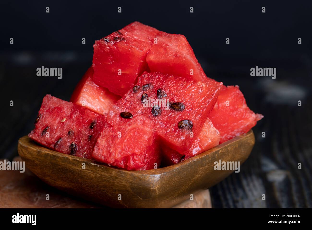 Sliced sweet watermelon of red color, pieces of watermelon on the table ...