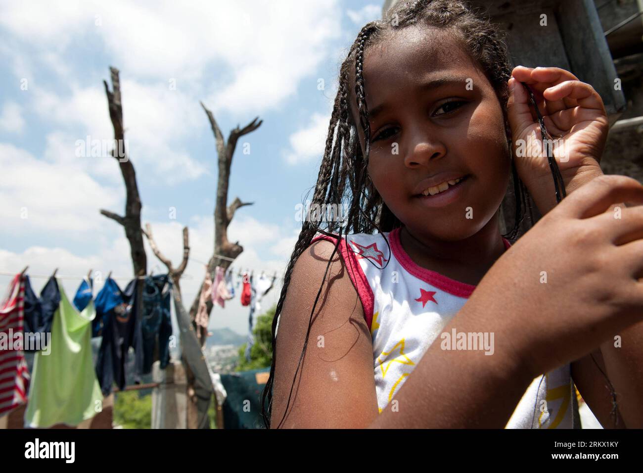 Girl in a favela hi-res stock photography and images - Alamy