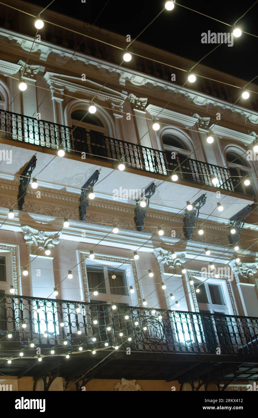 Historic building exterior in classical style. White and beige, tall ...