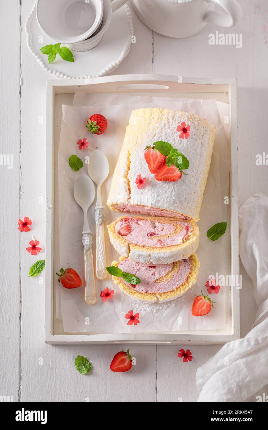 Delicious strawberry roulade as fresh summer cake. Strawberry cake made ...