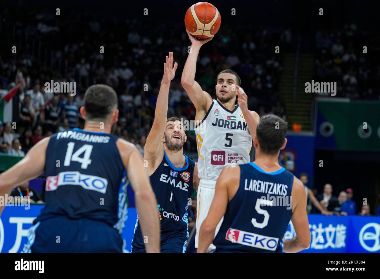 Jordan guard Freddy Ibrahim (5) shoots over Greece guard Giannoulis ...