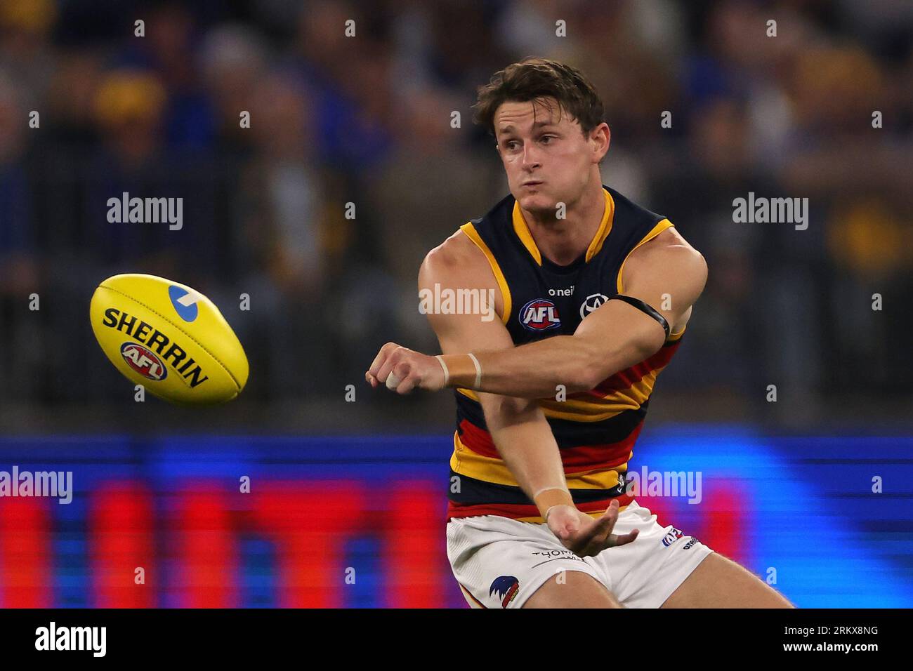 Perth, Australia. 26th Aug, 2023. Matt Crouch of the Crows handballs ...