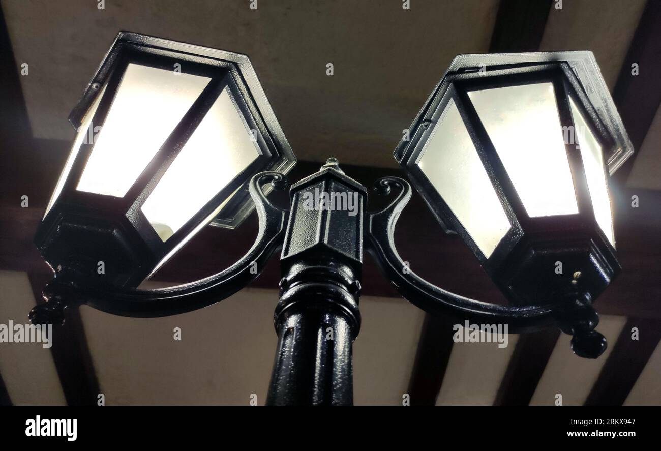 Old street lights in the dark background, vintage lamps, architecture ...