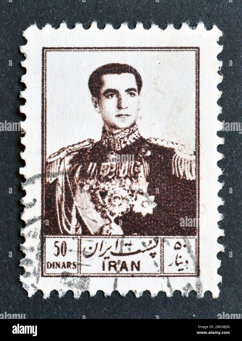 Cancelled postage stamp printed by Iran, that shows portrait of king ...