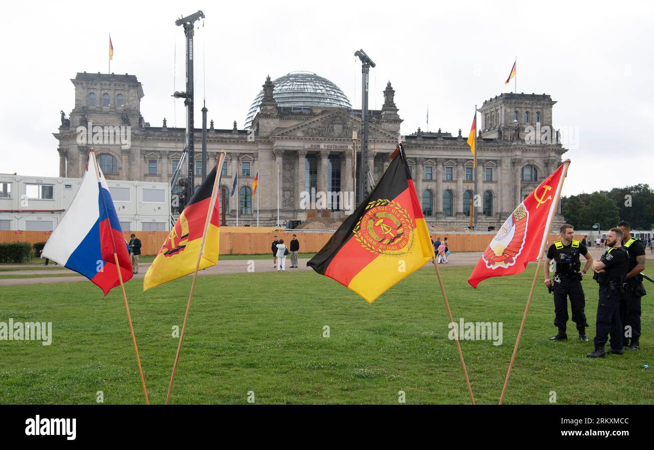Berlin, Germany. 26th Aug, 2023. Flags stand on the lawn in front of ...