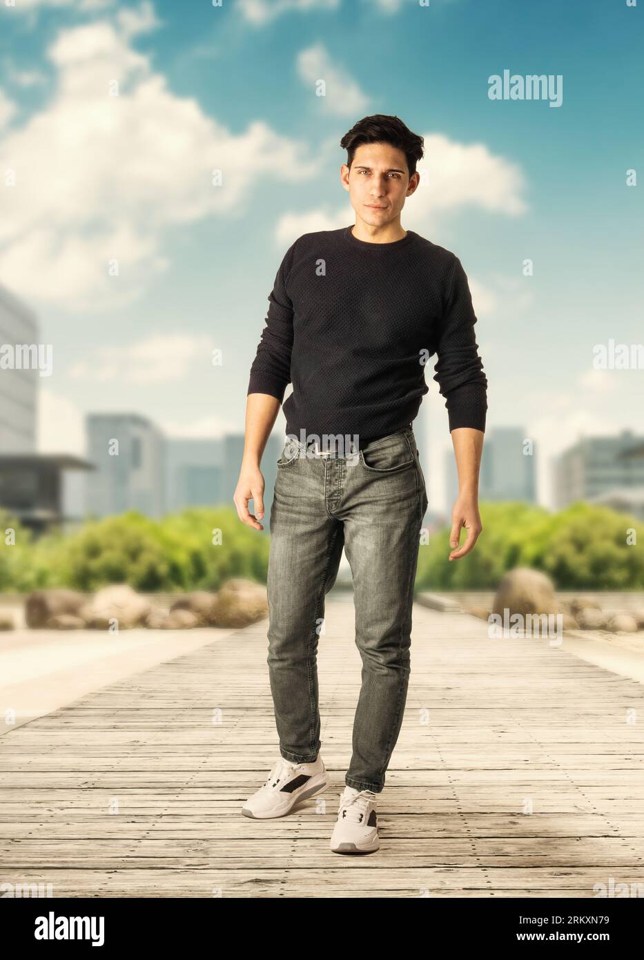 Man standing on wooden walkway hi-res stock photography and images - Alamy