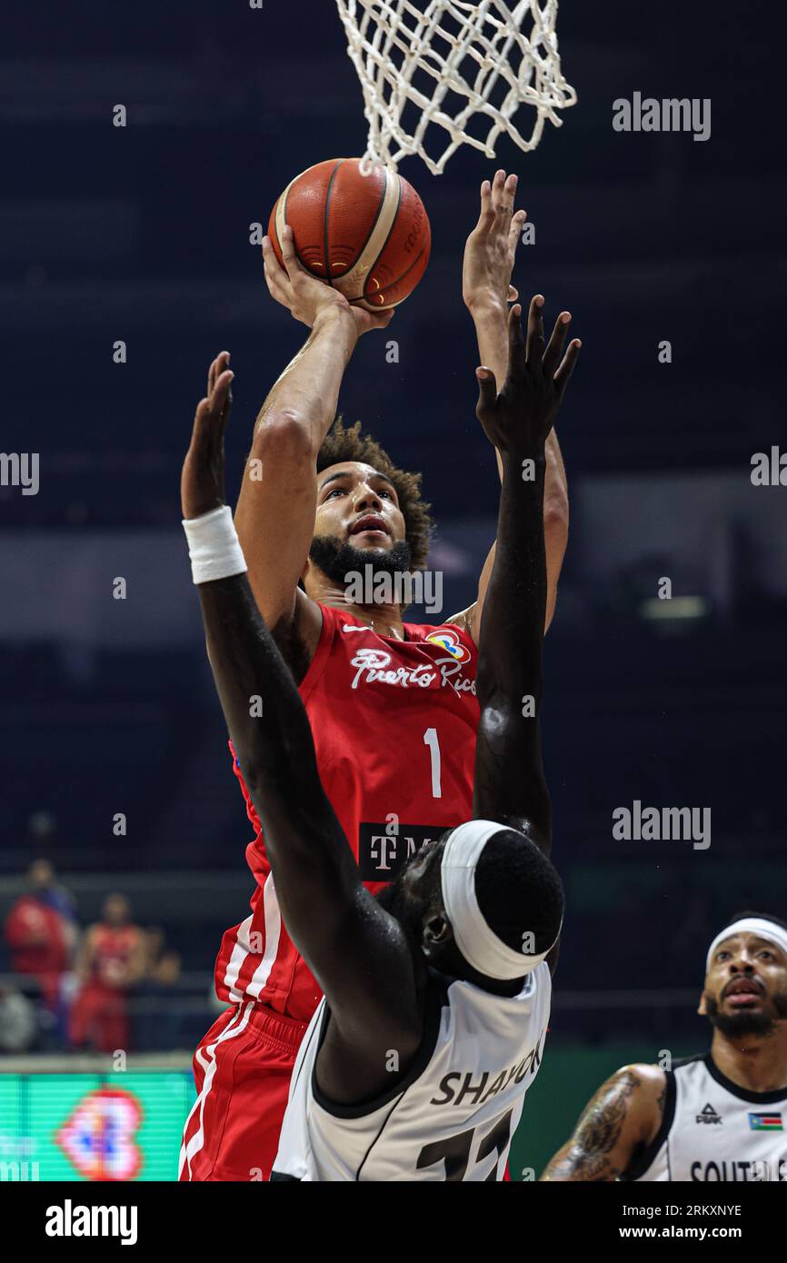 Manila, Philippines. 26th Aug, 2023. George Conditt (top) of Puerto ...