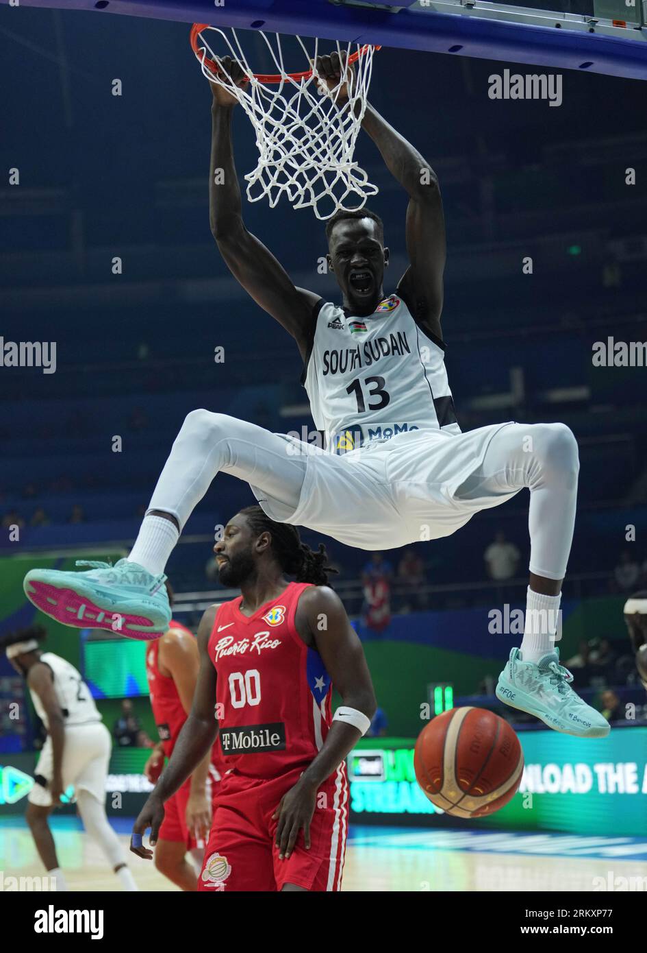 Manila, Philippines. 26th Aug, 2023. Majok Deng (front) of South Sudan ...