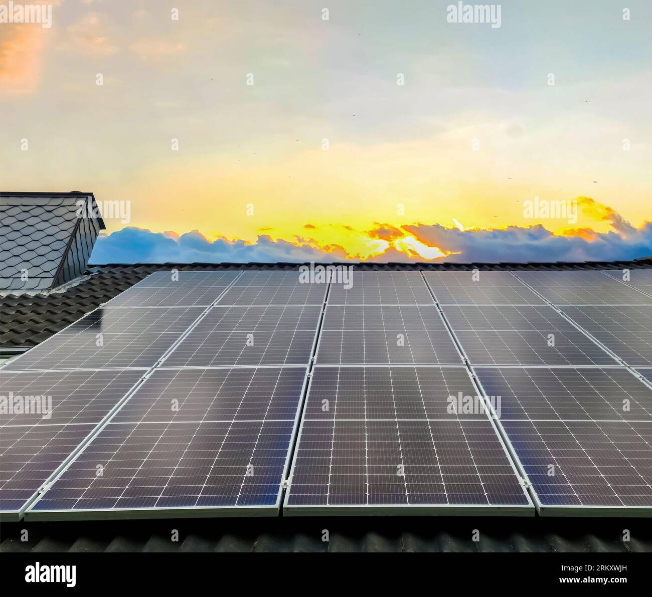 Solar Panels Producing Clean Energy On A Roof Of A Residential House ...