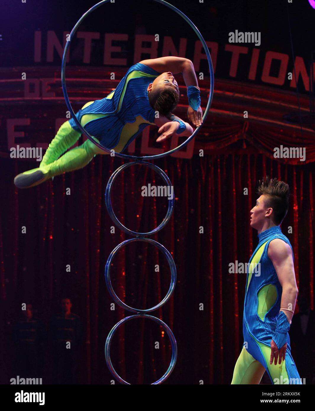 Jumping through hoops hi-res stock photography and images - Alamy