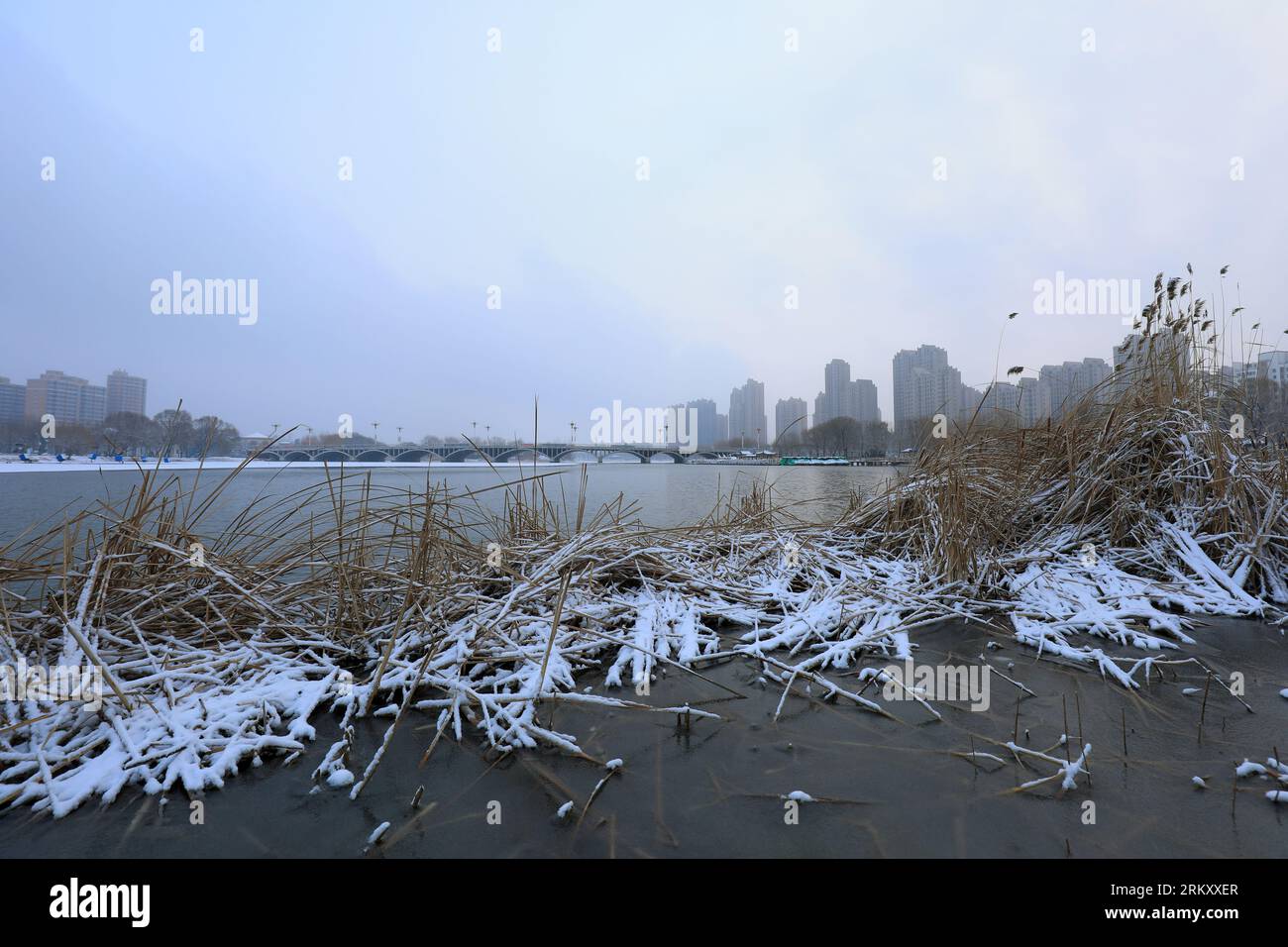 Winter scenery of waterfront city Stock Photo - Alamy