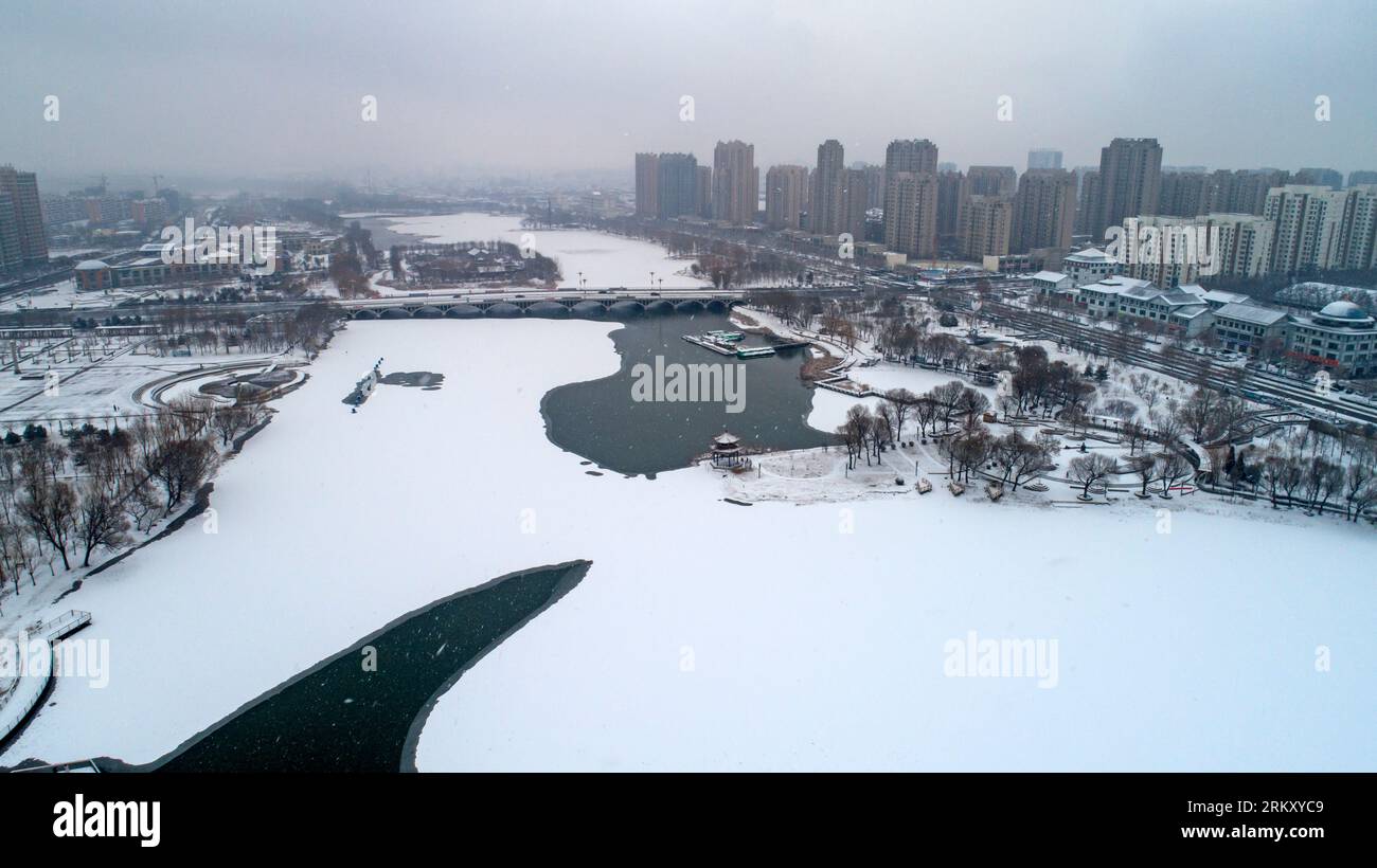Snowscape of waterfront city, aerial photo Stock Photo - Alamy