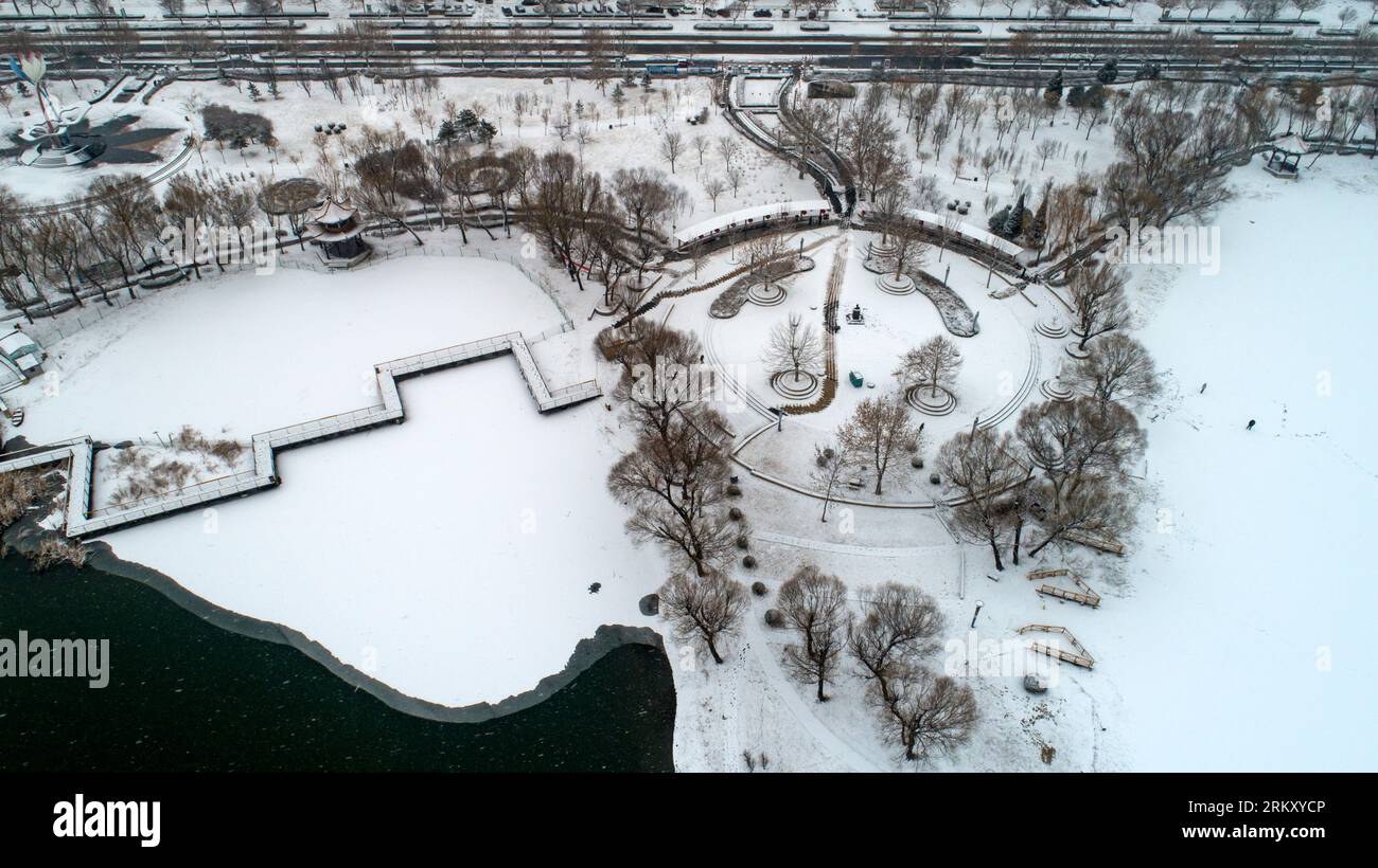 Snowscape of waterfront city, aerial photo Stock Photo - Alamy