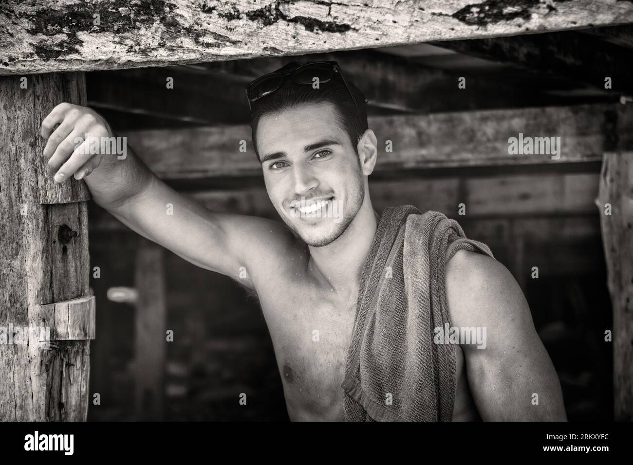Photo of a man posing with a towel around his neck Stock Photo - Alamy