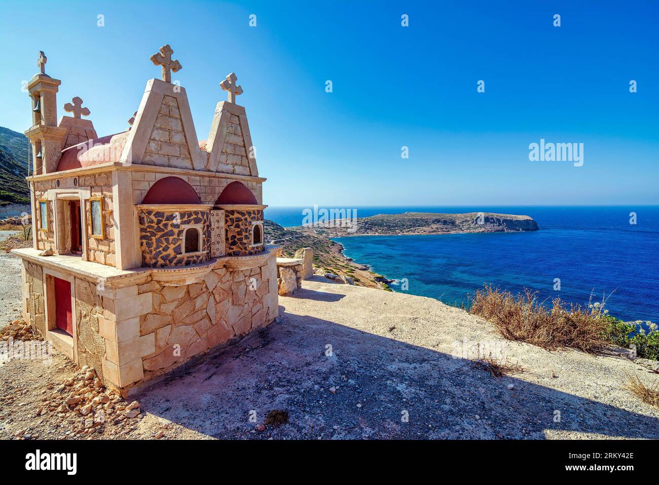 Typical Greek miniature roadside shrine. Small Greek Orthodox chapel at ...