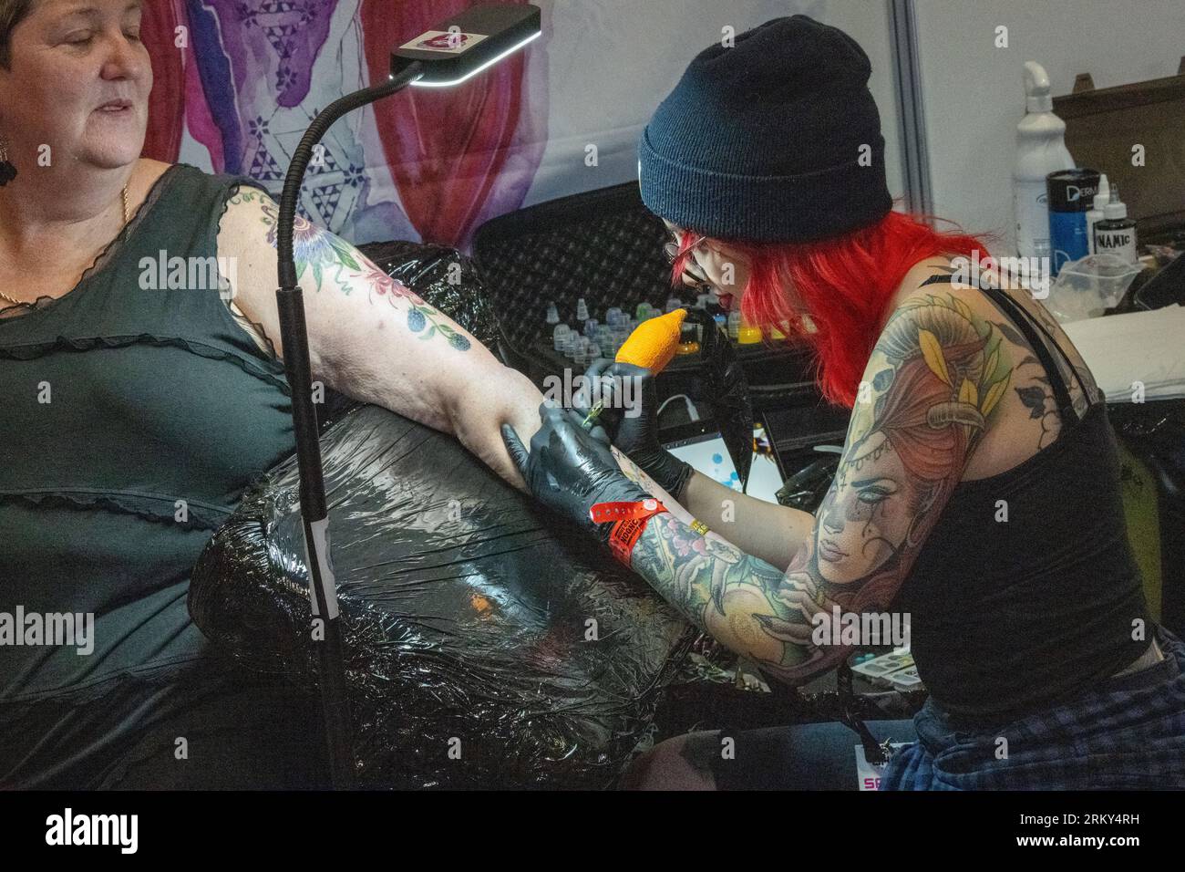 Tattoo booths hi-res stock photography and images - Alamy