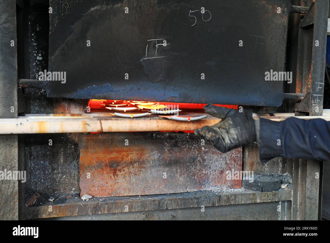 The hot forming furnace of steel spade is in a factory Stock Photo - Alamy
