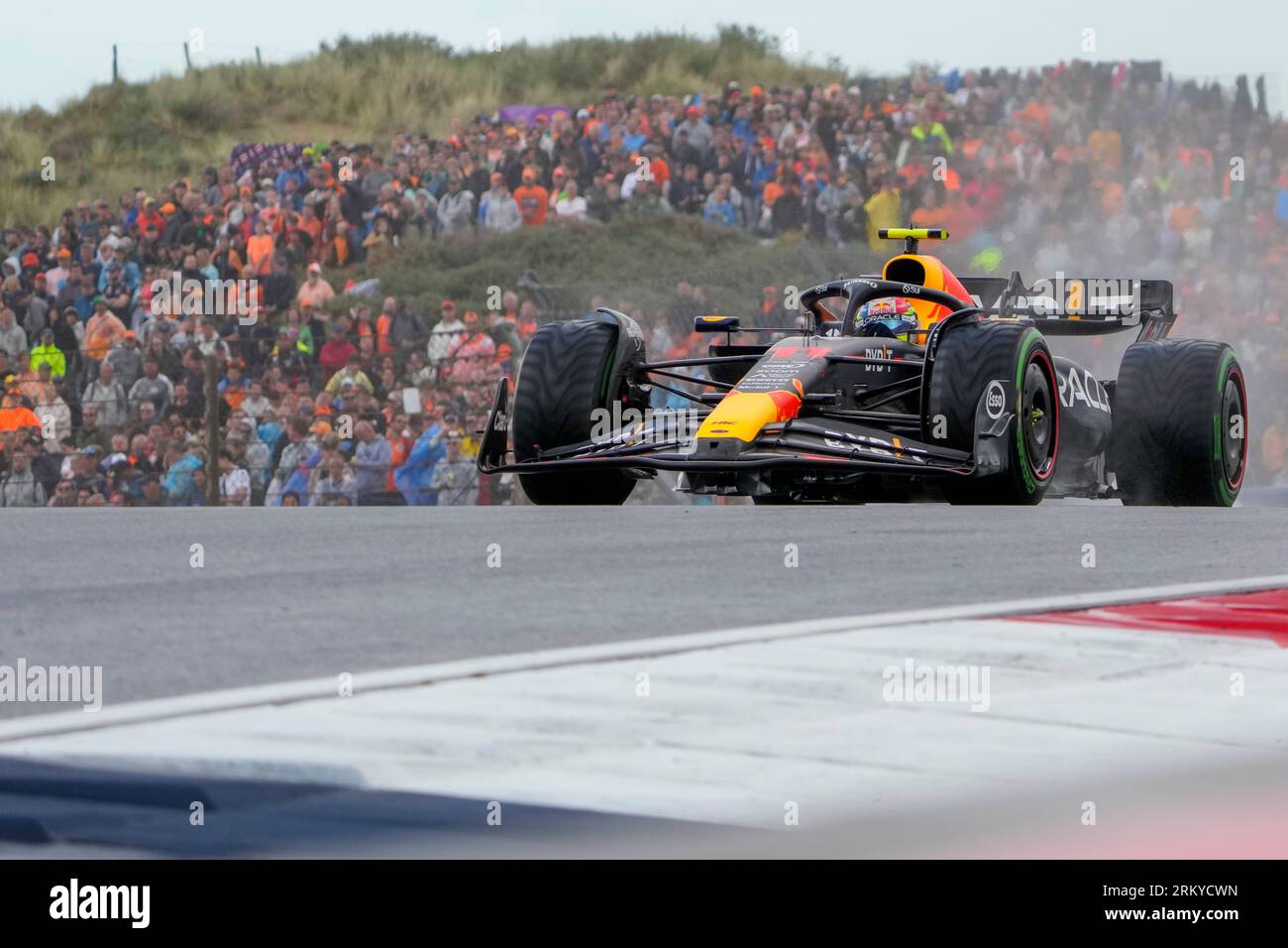Mexican Formula One driver Sergio Perez of Red Bull Racing steers his car during the qualifying ...