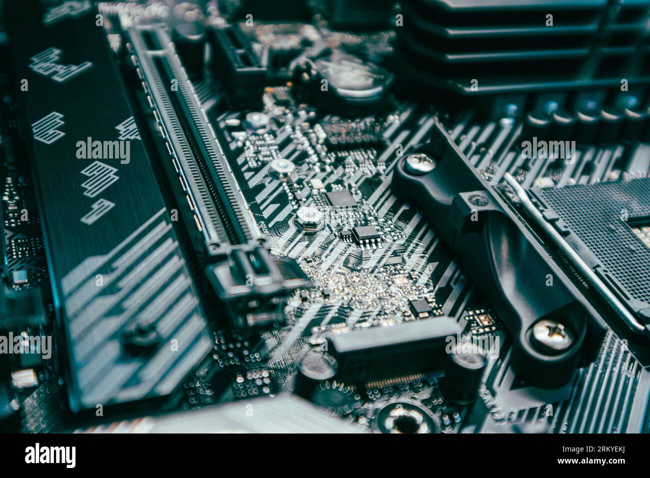 Motherboard with sockets and microchips close-up on modern powerful ...