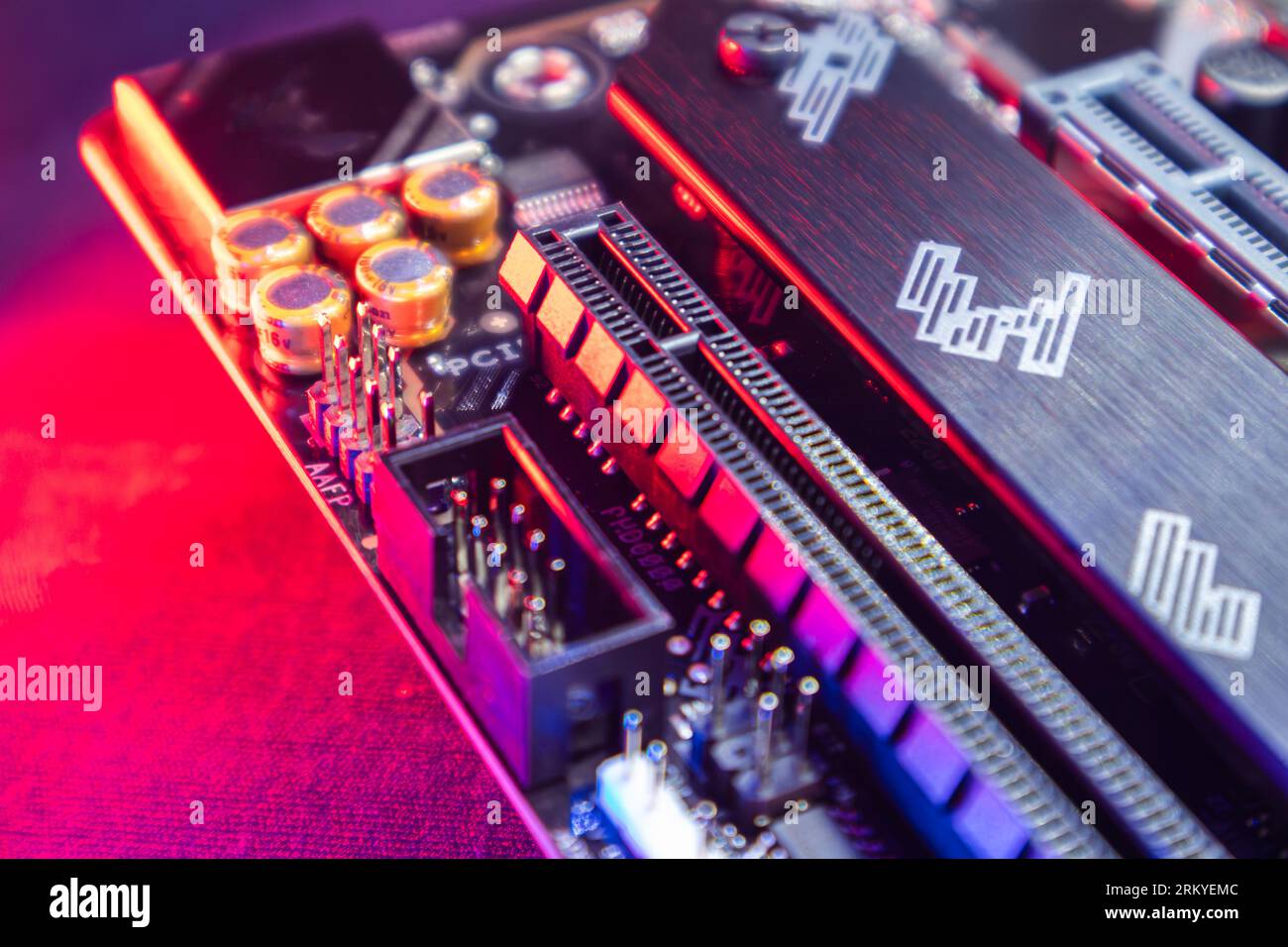 Motherboard sockets close-up on modern powerful desktop PC in colorful ...