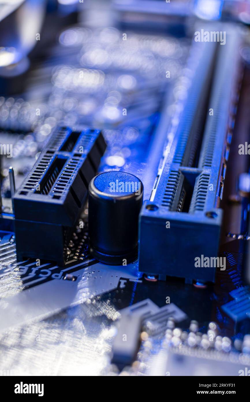 Motherboard sockets, connectors and microchips close-up on desktop PC ...