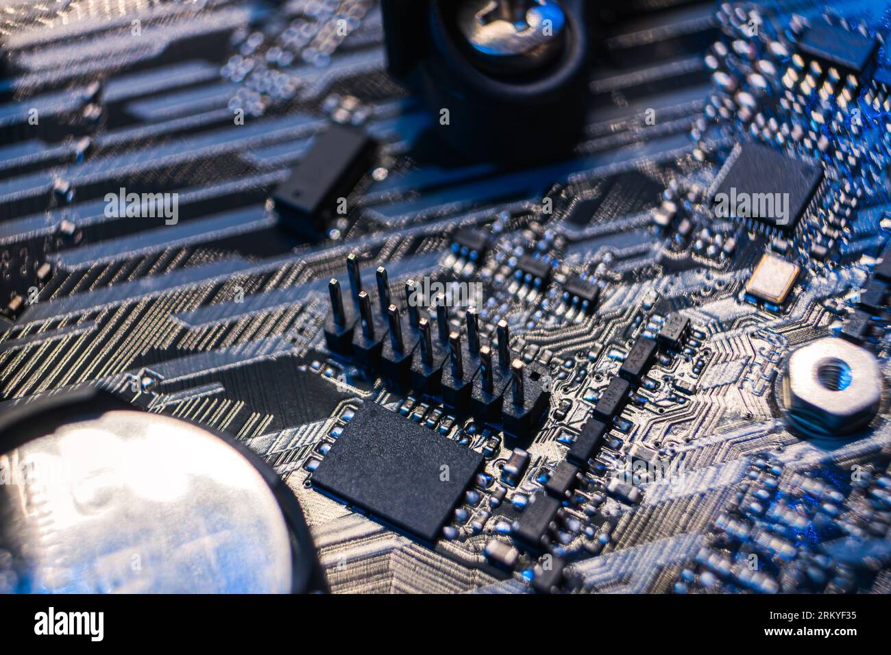 Motherboard with sockets and connectors close-up on desktop PC in blue ...