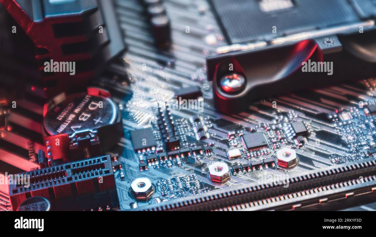 Motherboard with microchips close-up on a desktop PC. Computer hardware ...