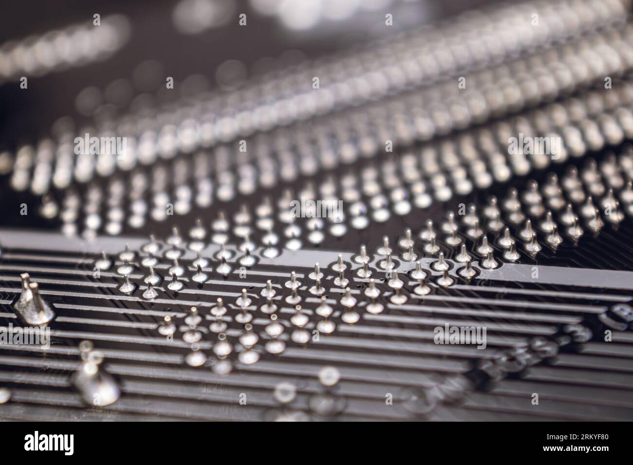 Motherboard backside close-up with pins contacts, desktop PC. Computer ...