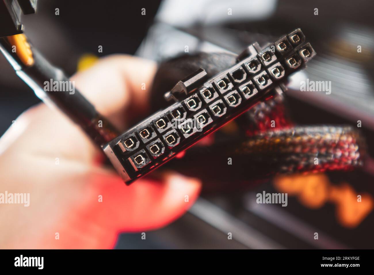 Cable connector (24 pin) from power supply unit of desktop PC close-up ...