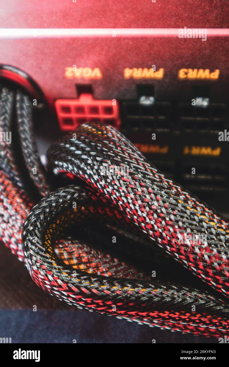 Power supply unit with wires, desktop PC parts close-up with selective ...