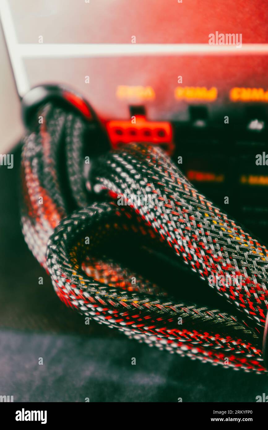 Wires on power supply unit of desktop PC close-up with selective focus ...
