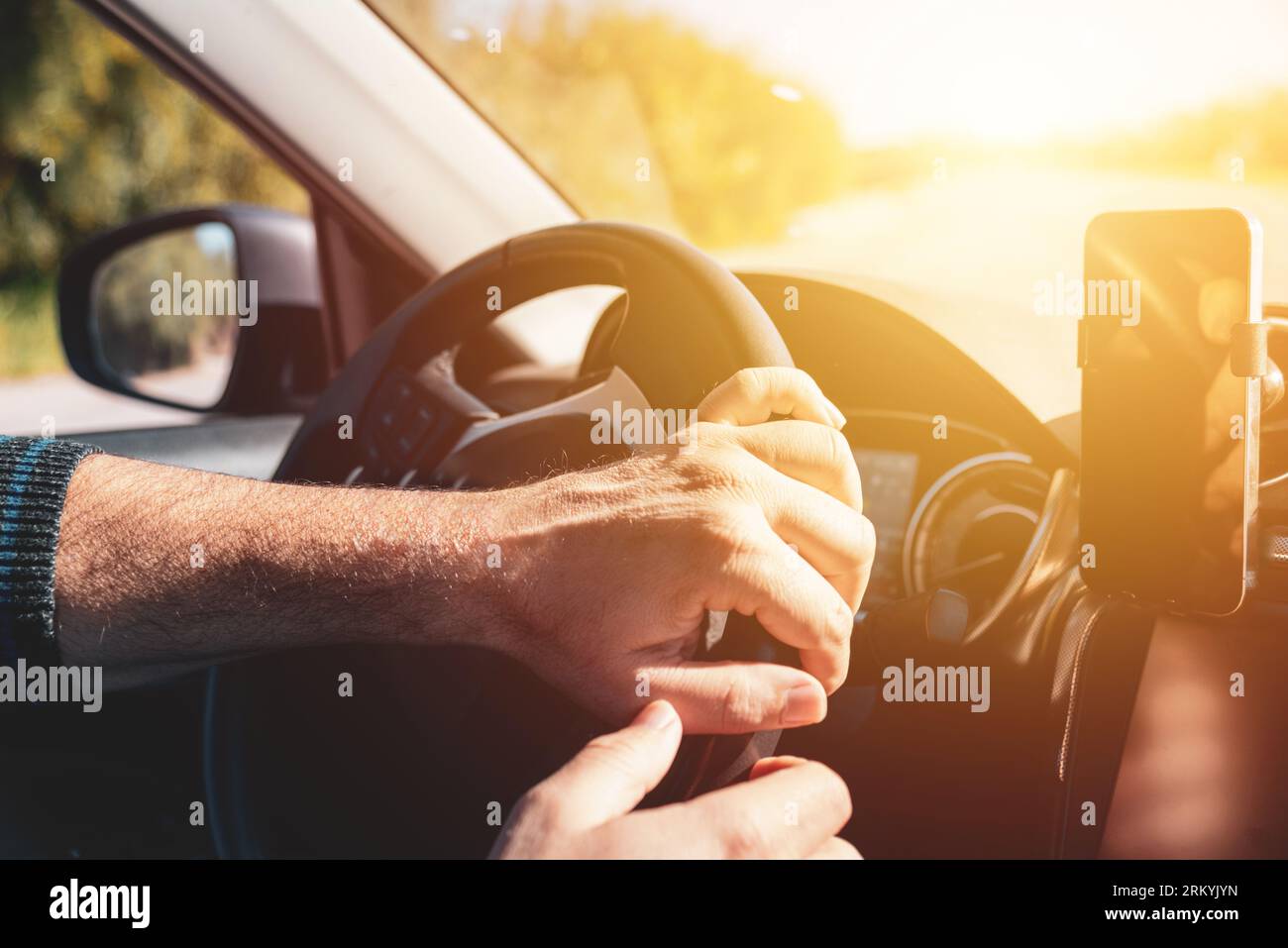 Hands on steering wheel hi-res stock photography and images - Alamy