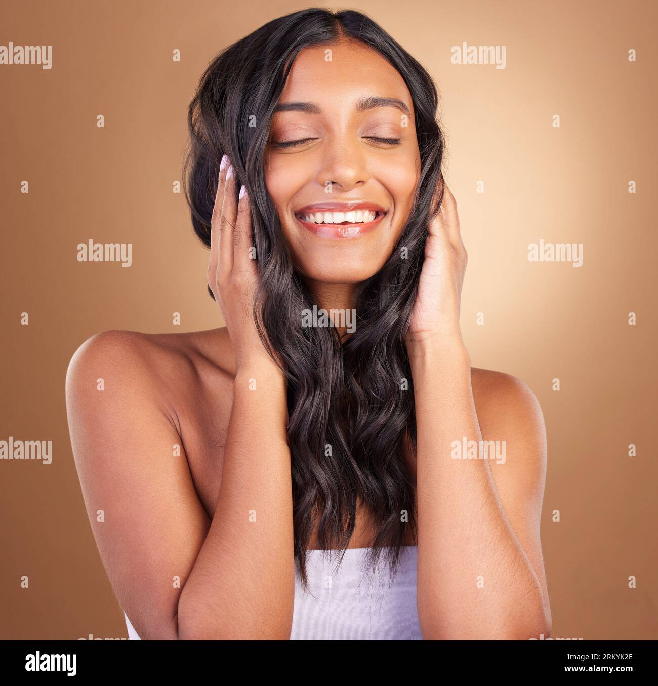 Portrait, hair care and woman with a smile, volume and wellness on a ...