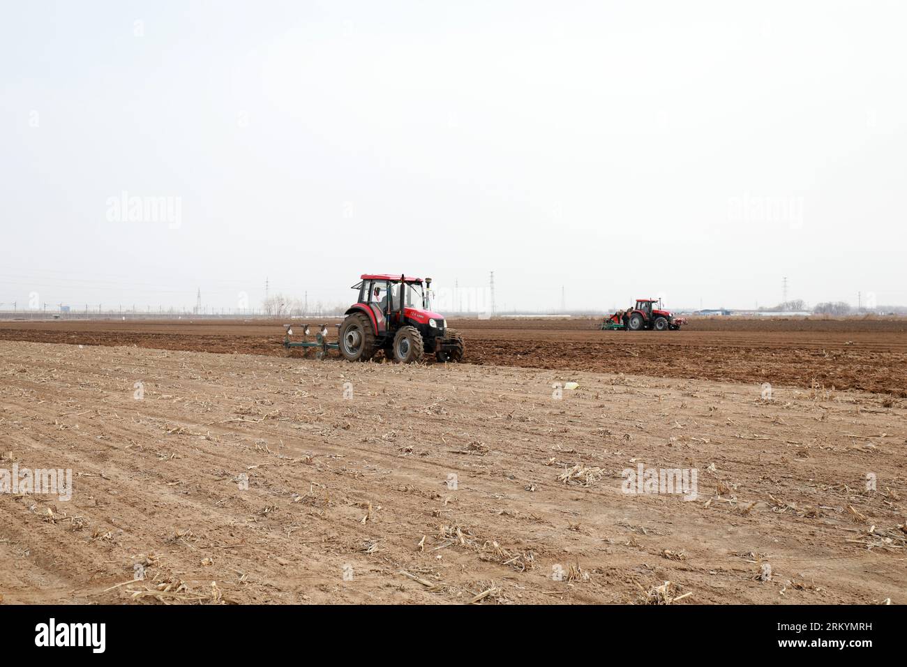 Farmers drive planters to grow potatoes on the farm Stock Photo - Alamy