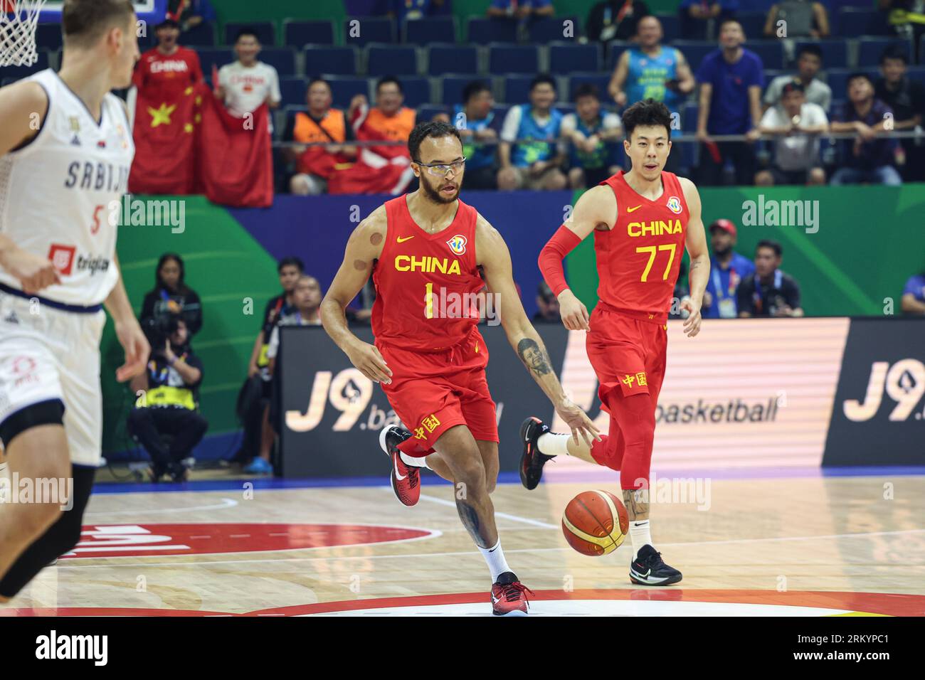 Manila, Philippines. 26th Aug, 2023. Li Kaier (C) of China drives the ...