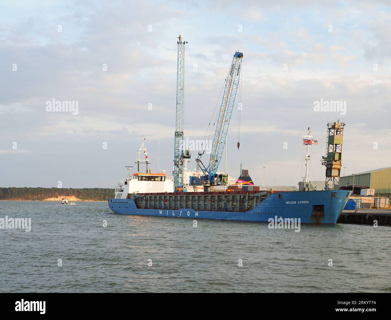 A medium size freighter ship seen being unloaded at Dockside Stock ...